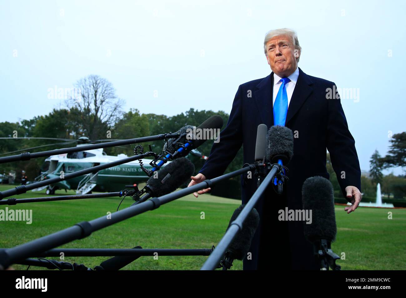 President Donald Trump speaks to the members of the media before ...