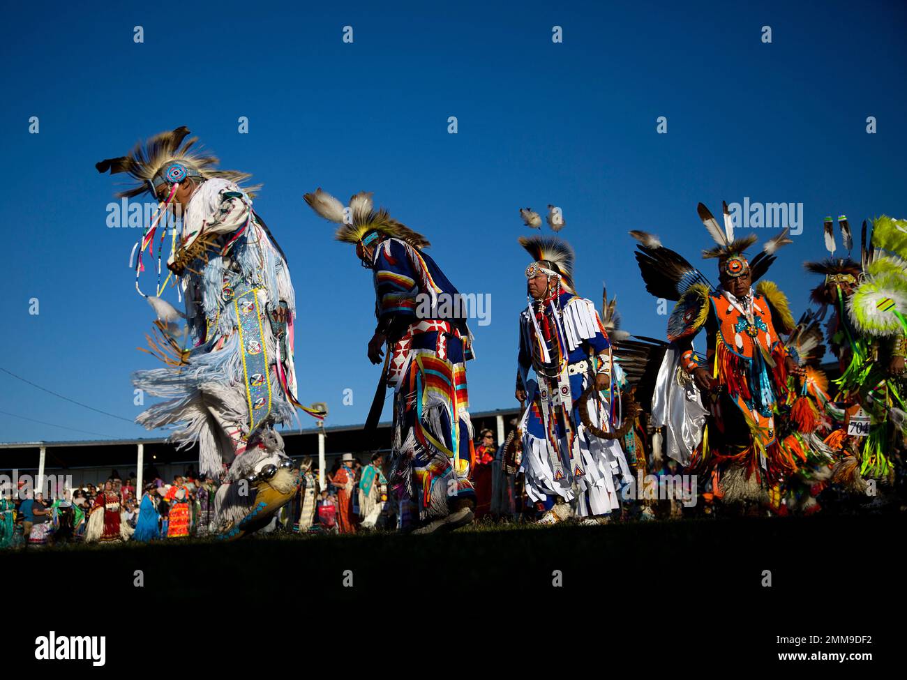 Men perform a traditional Native American dance during the North ...