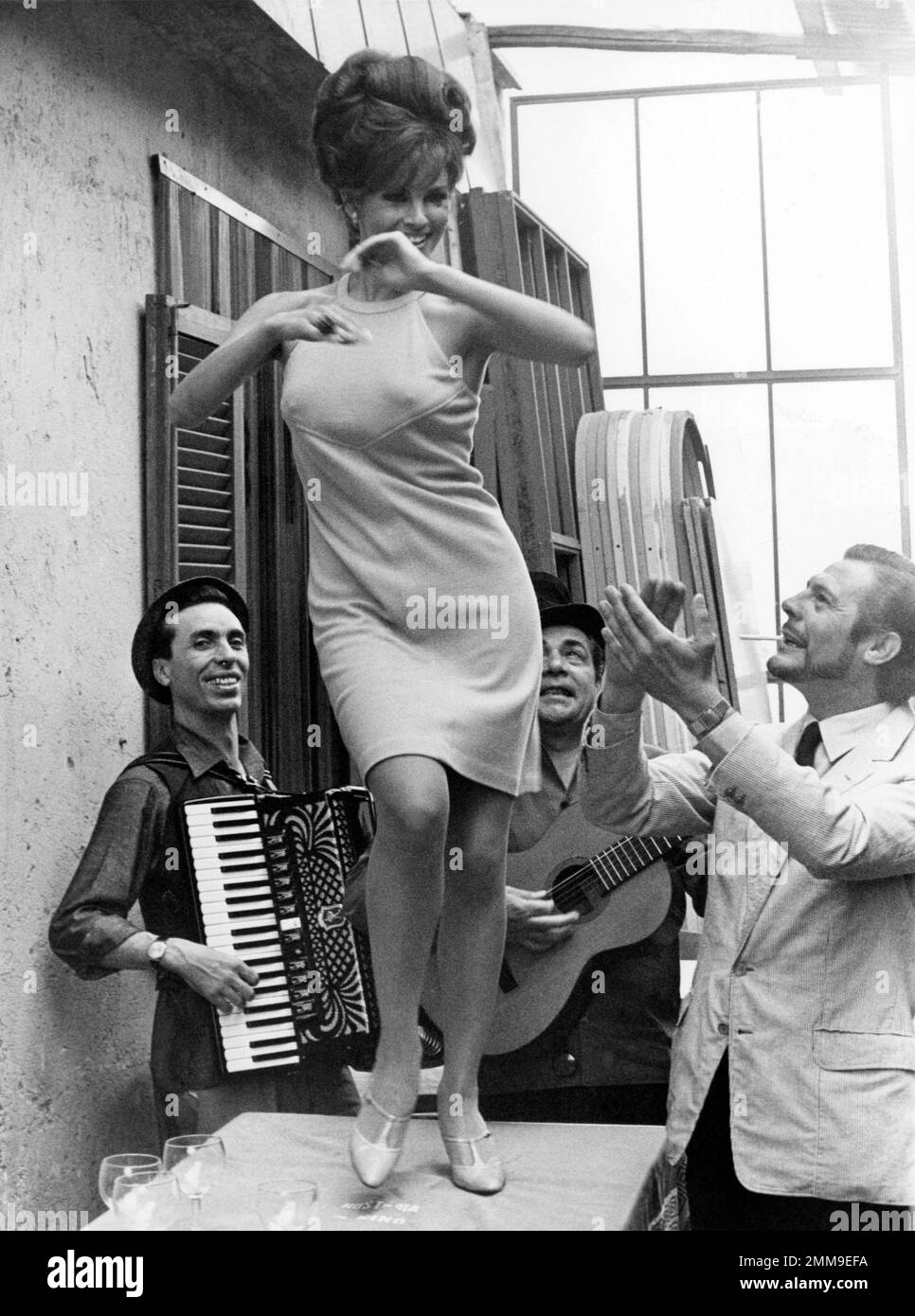 Italian actor Marcello Mastroianni, right, applauds as young Hollywood ...