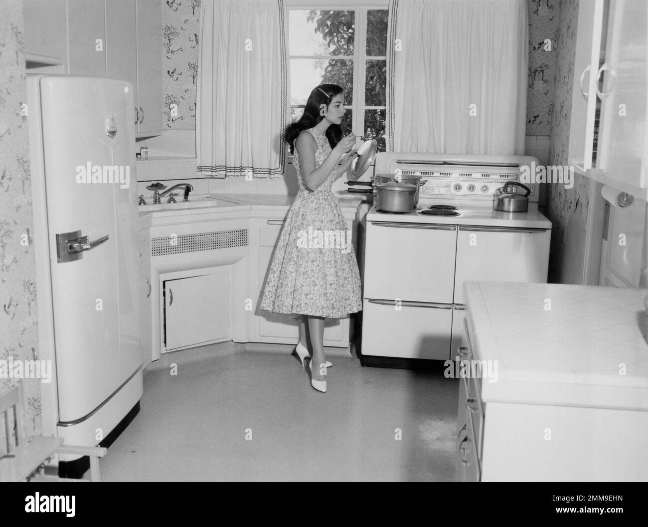 In the Damone kitchen, Pier Angeli previews dinner, prepared by the ...