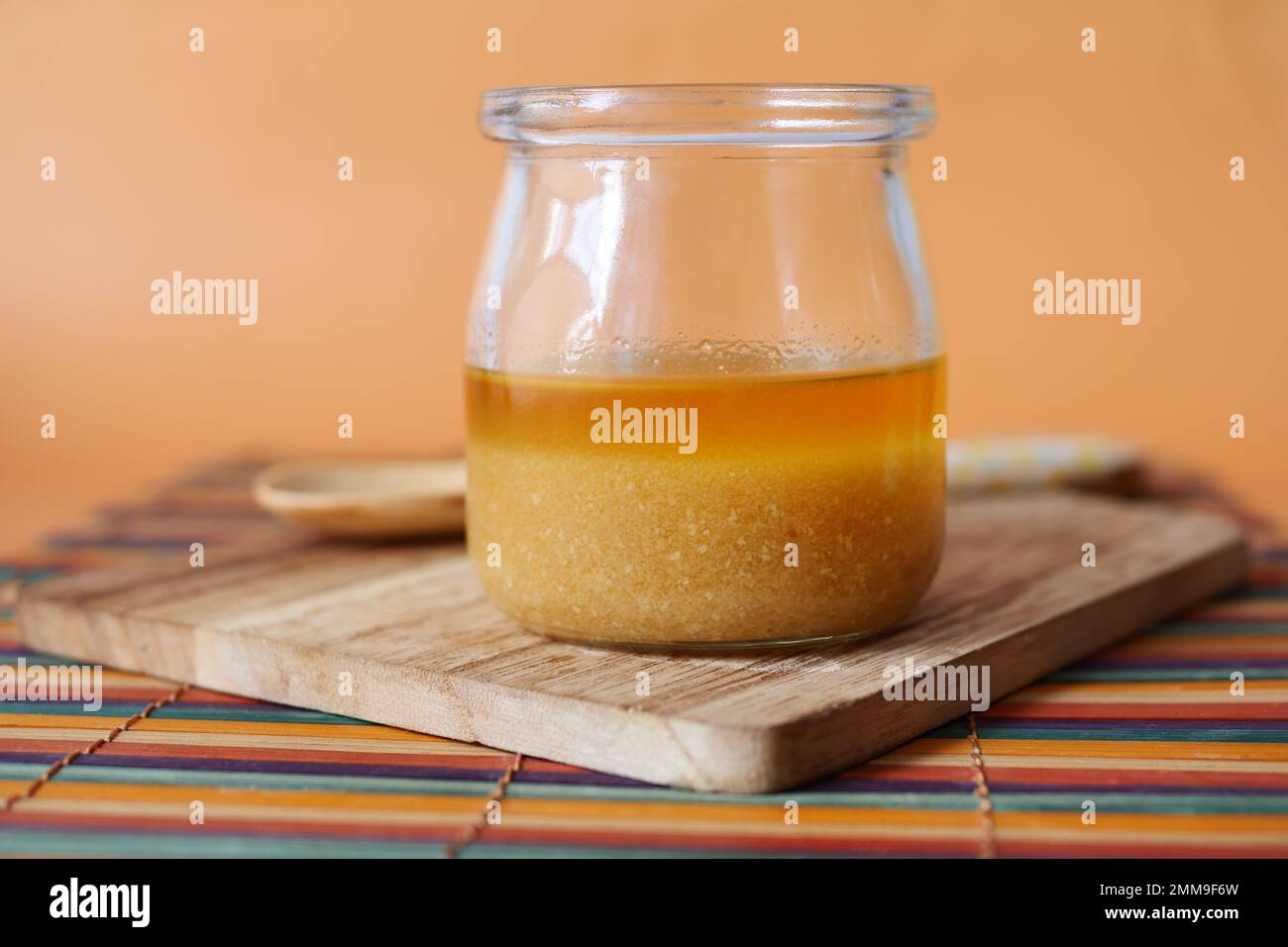 homemade ghee in container on a table Stock Photo - Alamy