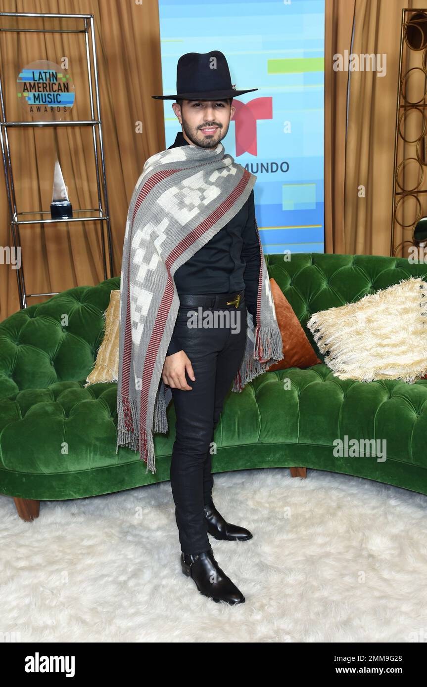 Joss Favela poses backstage at the Latin American Music Awards at the ...