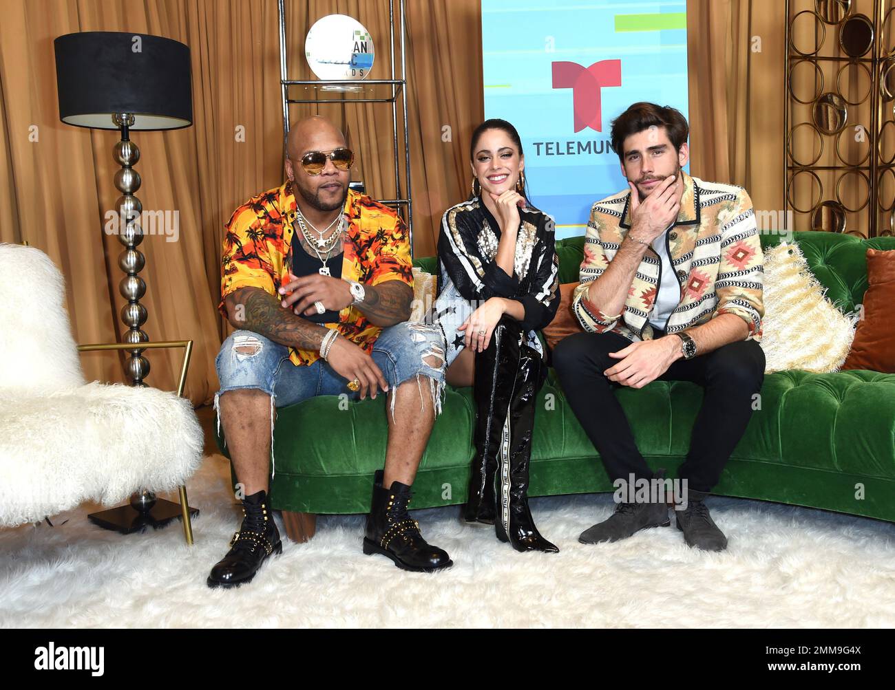 Flo Rider, from left, Titi and Alvaro Soler pose backstage at the Latin ...