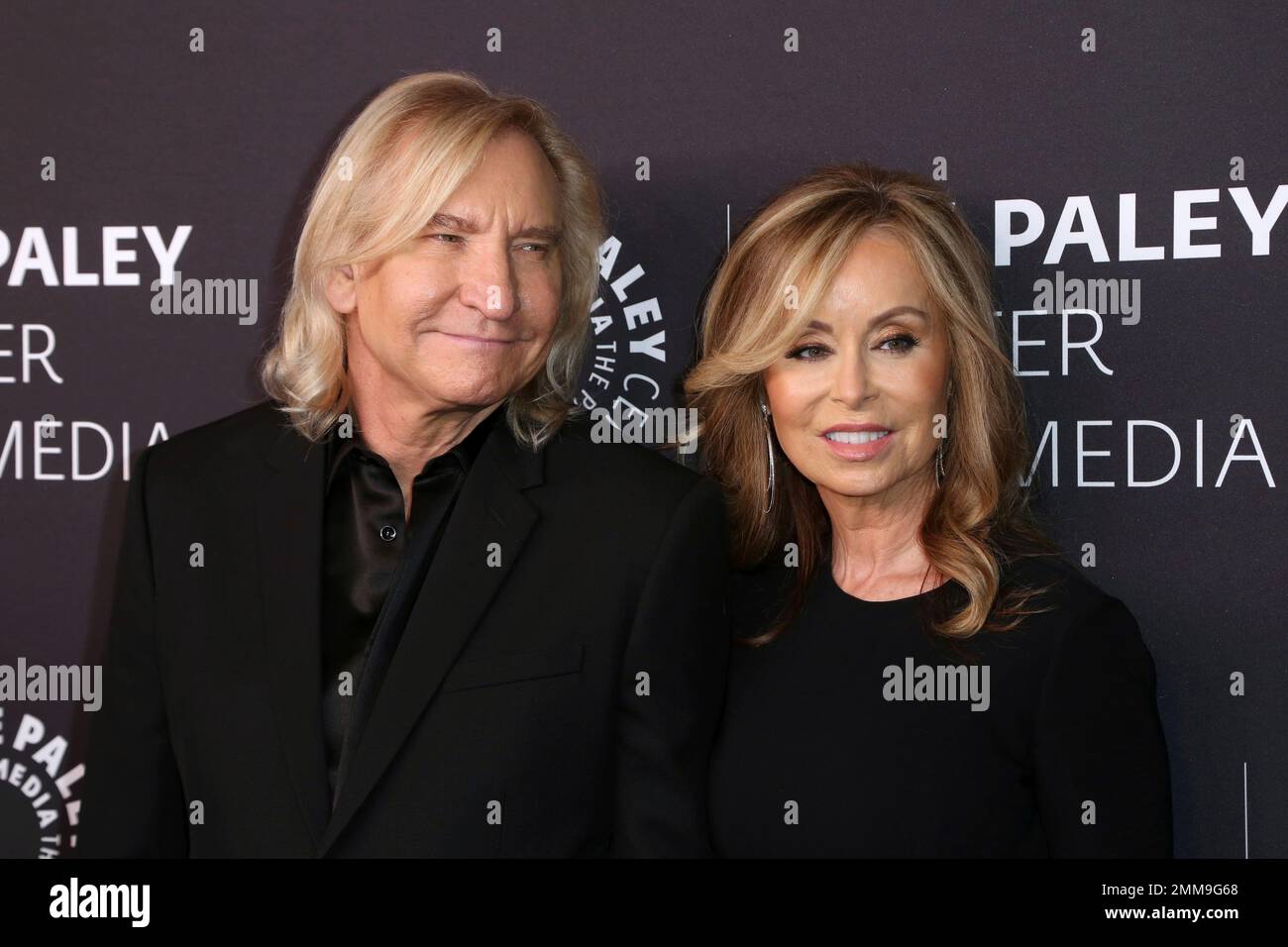 Joe Walsh, left, and Marjorie Bach arrive at the 'Paley Honors in ...