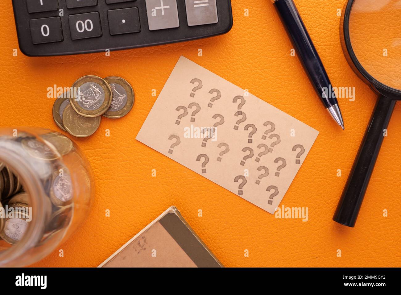 high angle view of question mark on paper on office desk Stock Photo ...