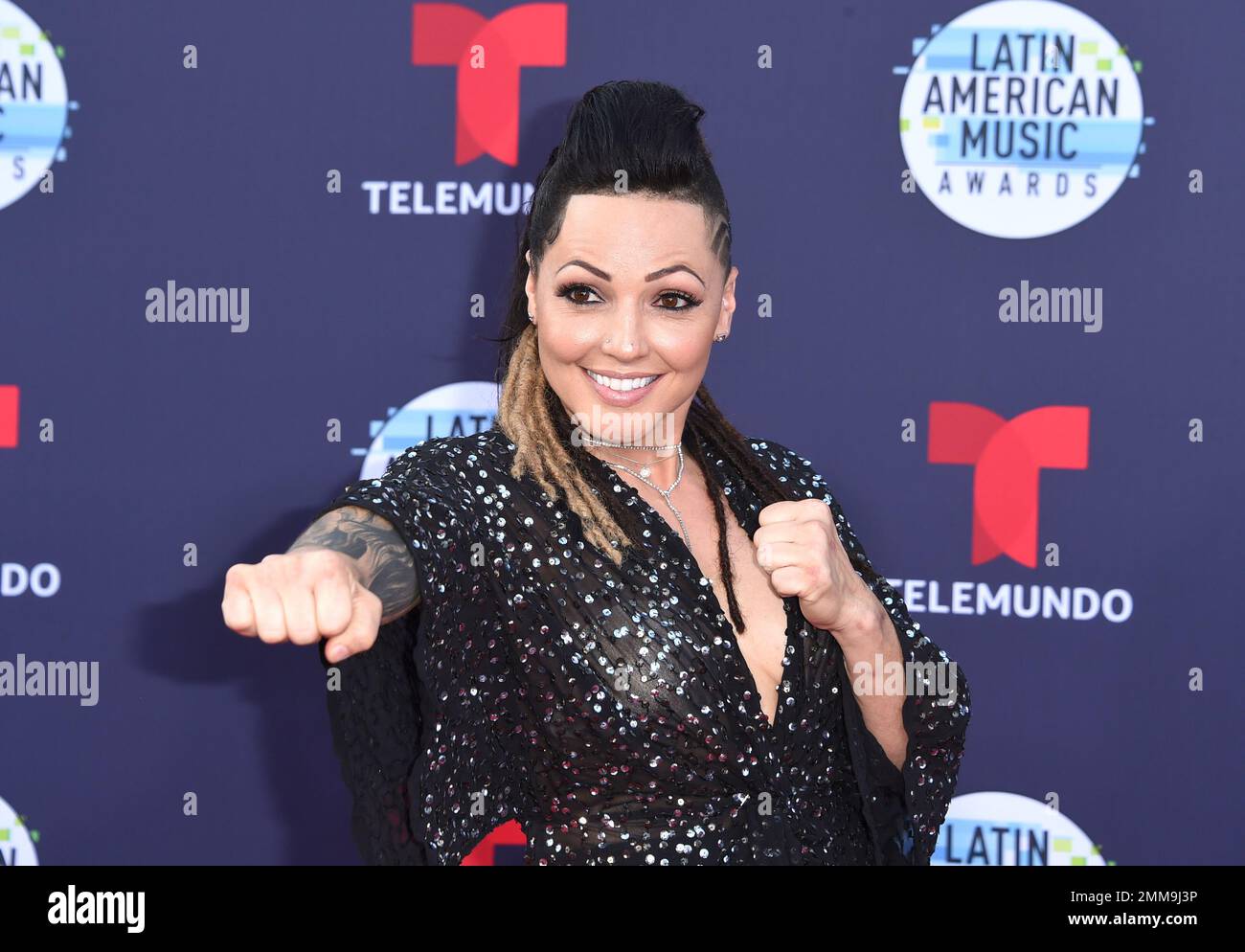 Jennifer Salinas arrives at the Latin American Music Awards at the ...