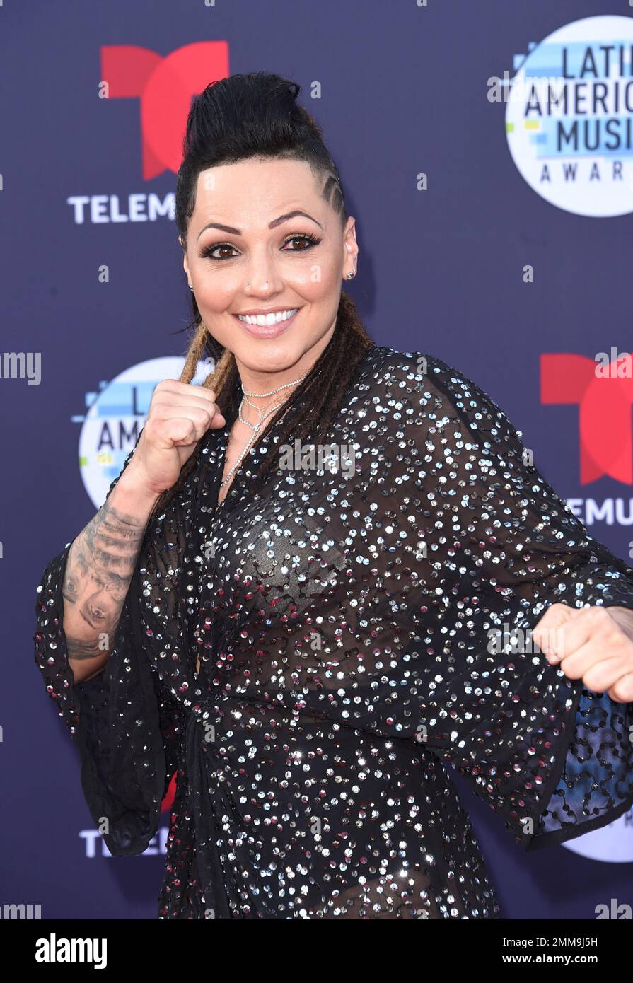 Jennifer Salinas arrives at the Latin American Music Awards at the ...