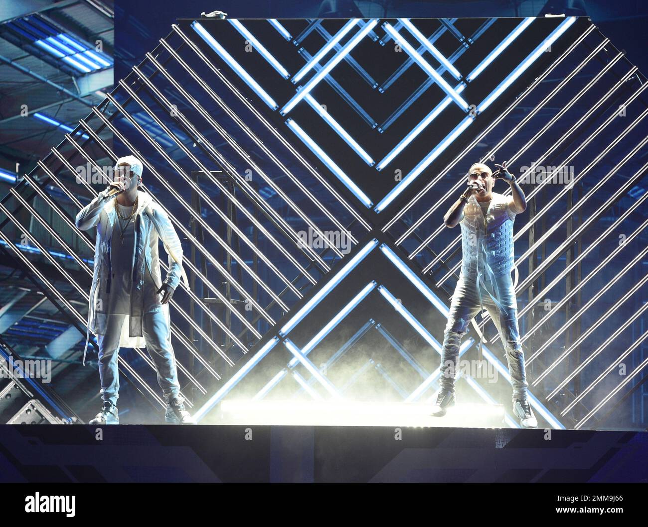 Wisin, left, and Yandel perform at the Latin American Music Awards at ...