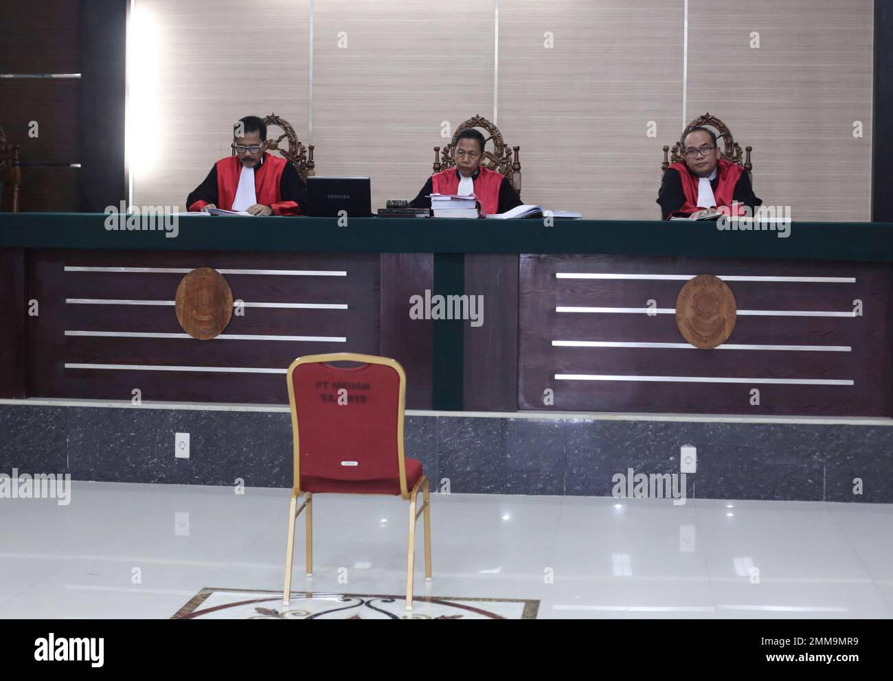 Indonesian judge Daliun Sailan, center, reads the court's decision to ...