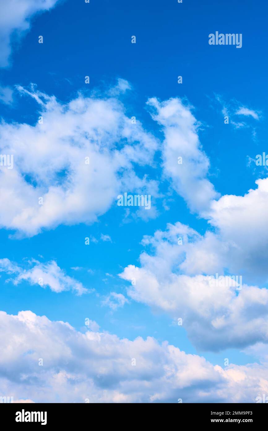 Clouds in the blue sky - cloudscape, vertical background Stock Photo ...