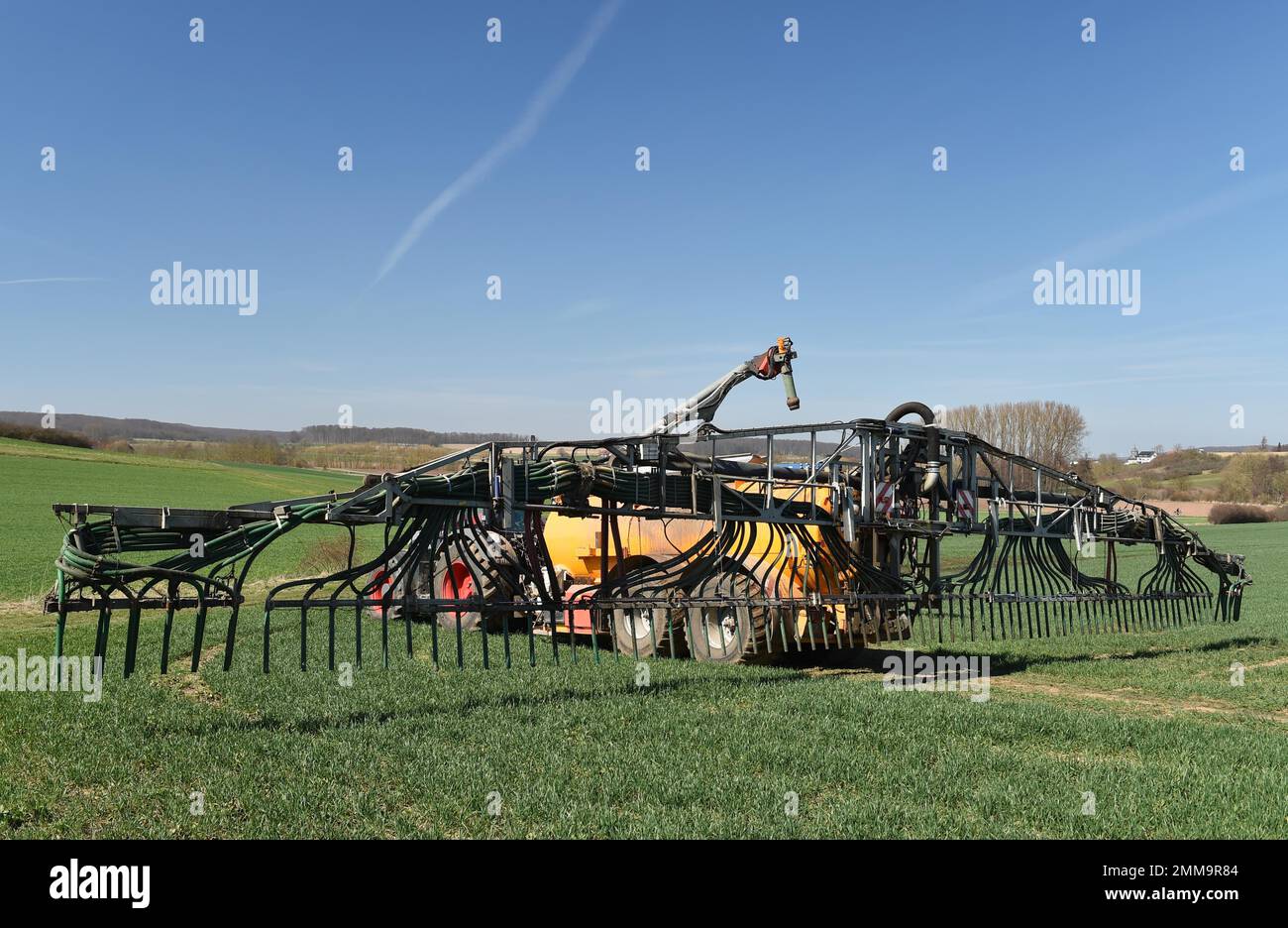 Slurry tanker brings slurry to a field, Hesse, Germany Stock Photo - Alamy