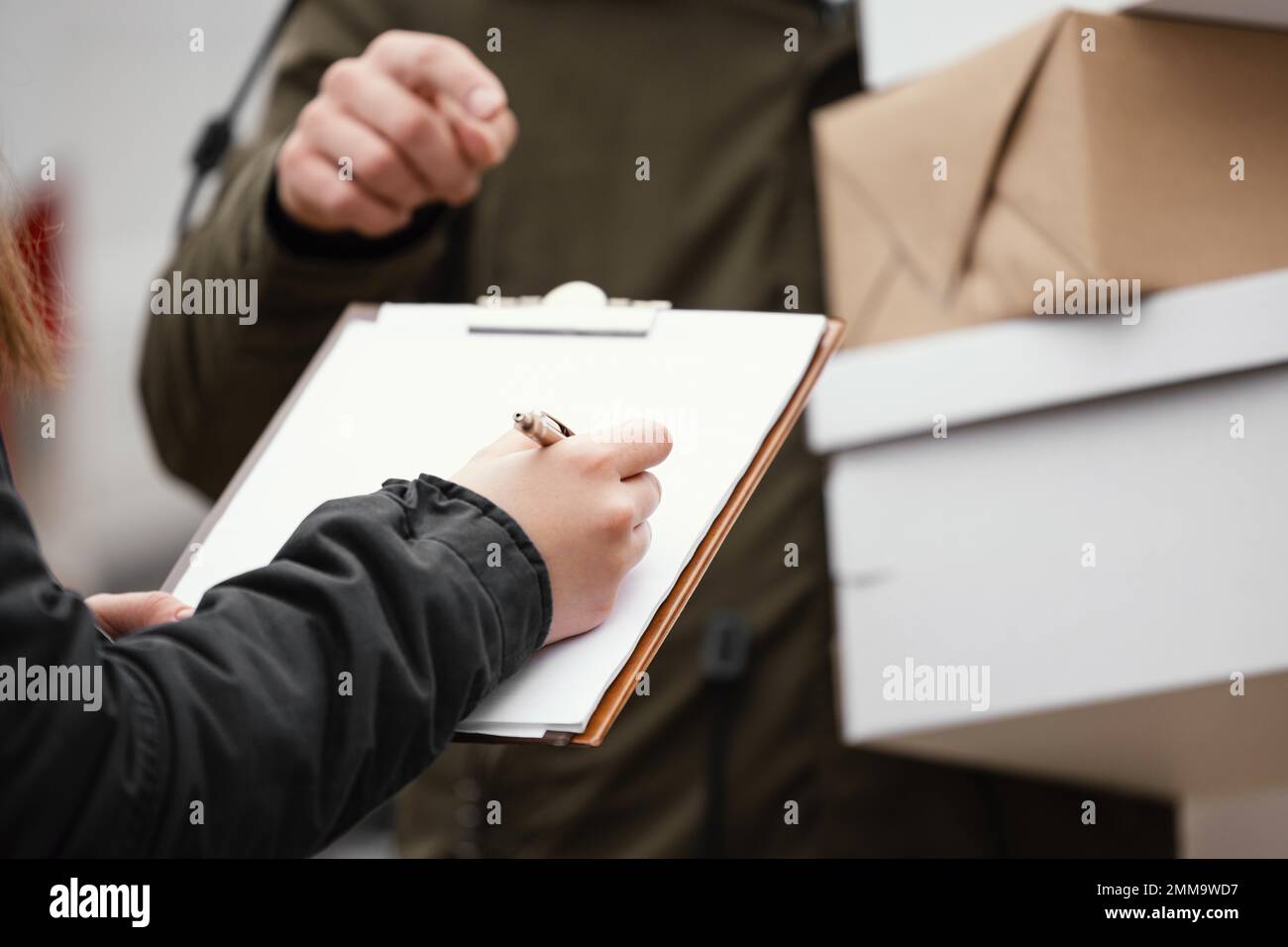 close up signing package delivery. Resolution and high quality ...