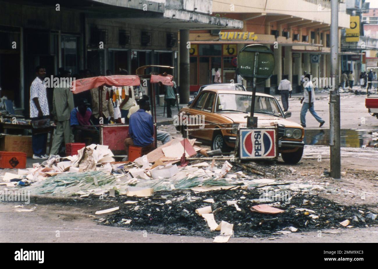 The streets of downtown Kinshasa littered with garbage after looting ...