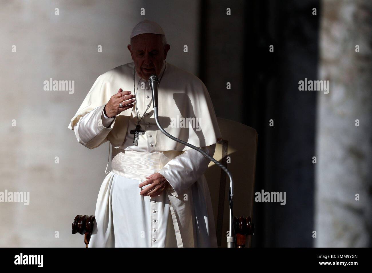 Pope Francis makes the sign of the cross during his weekly general ...