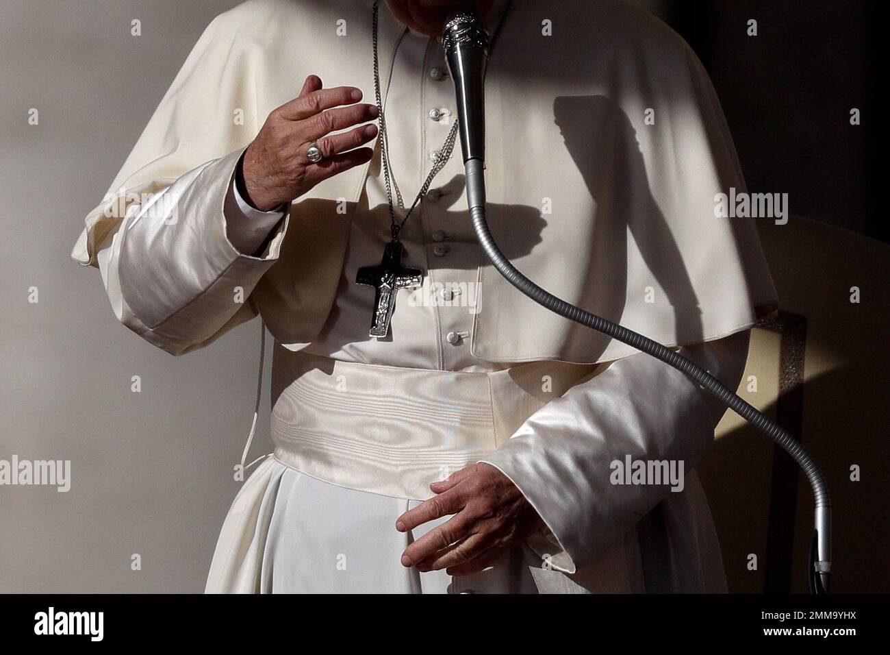 Pope Francis makes the sign of the cross during his weekly general ...