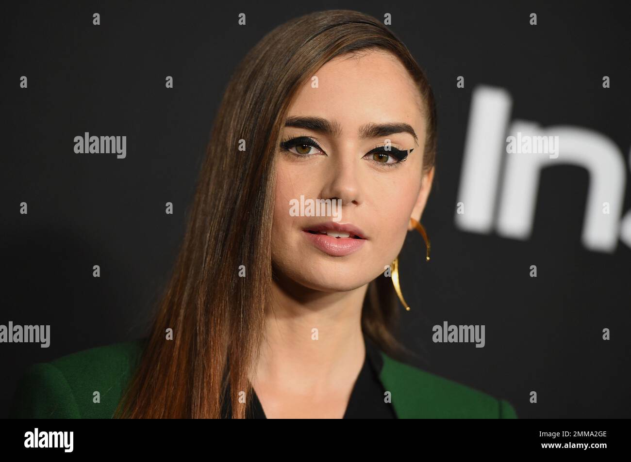 Lily Collins arrives at the fourth annual InStyle Awards at The Getty ...