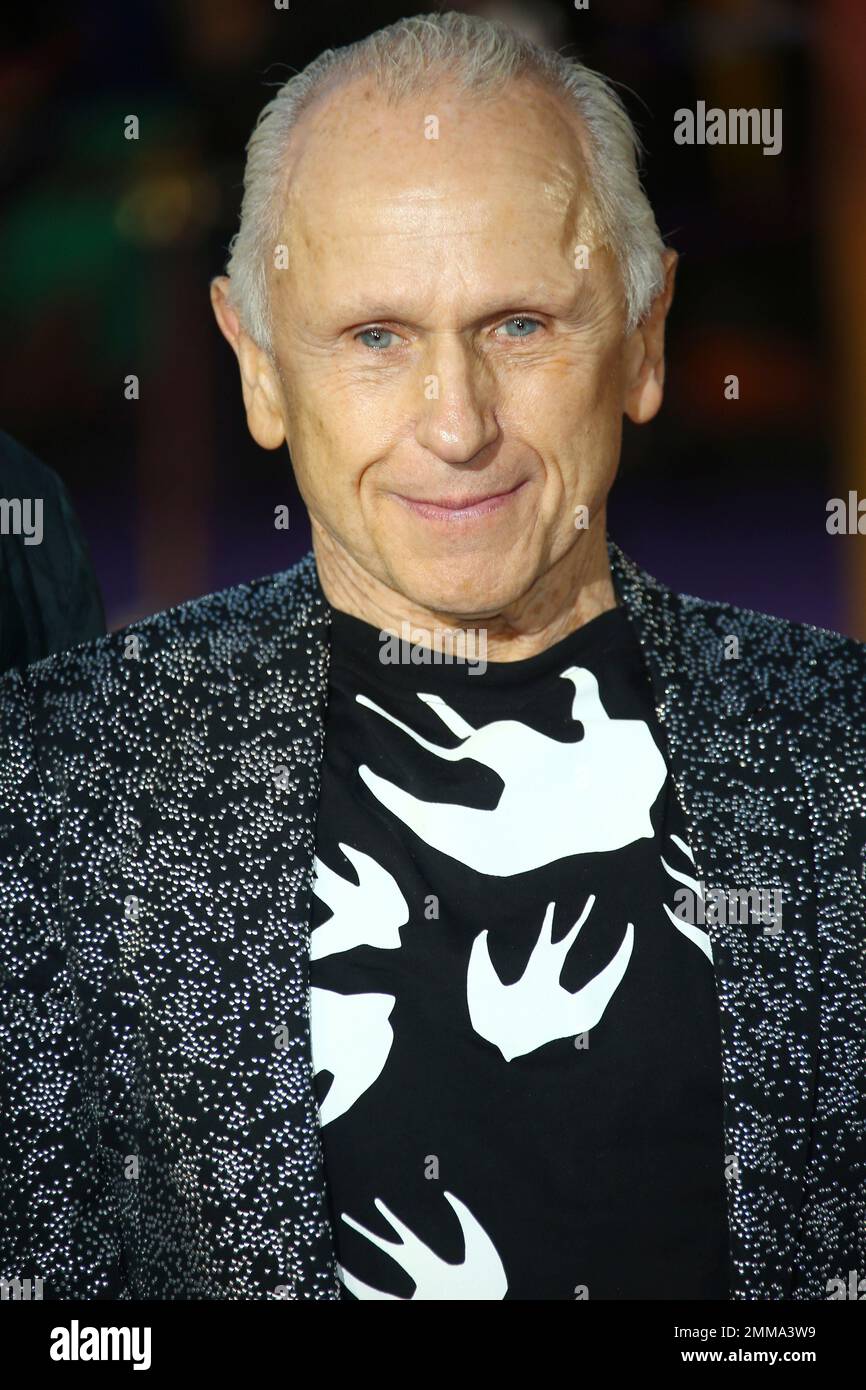 Dancer Wayne Sleep poses for photographers upon arrival at the World ...