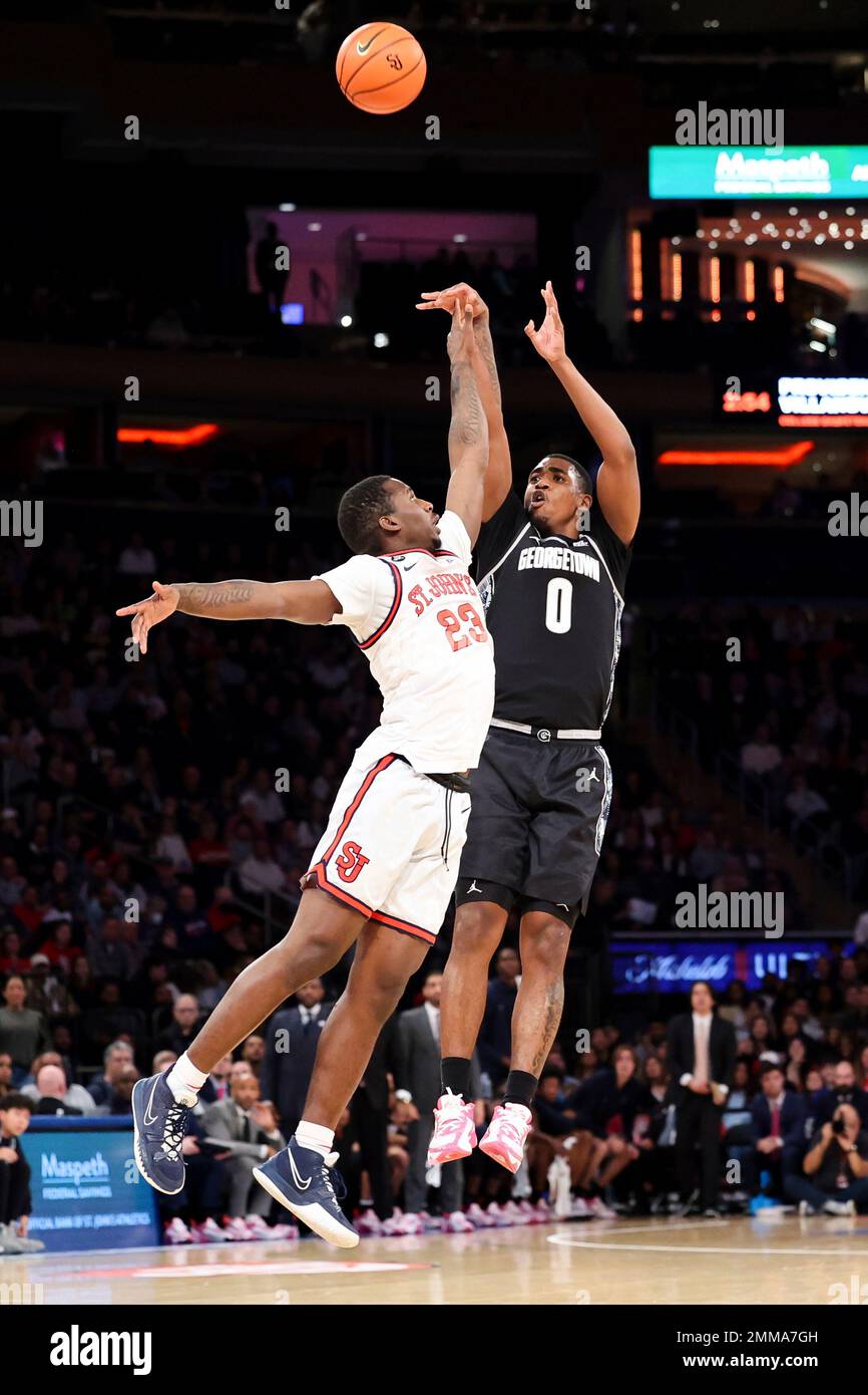 Georgetown guard Brandon Murray (0) shoots a three point shot against ...