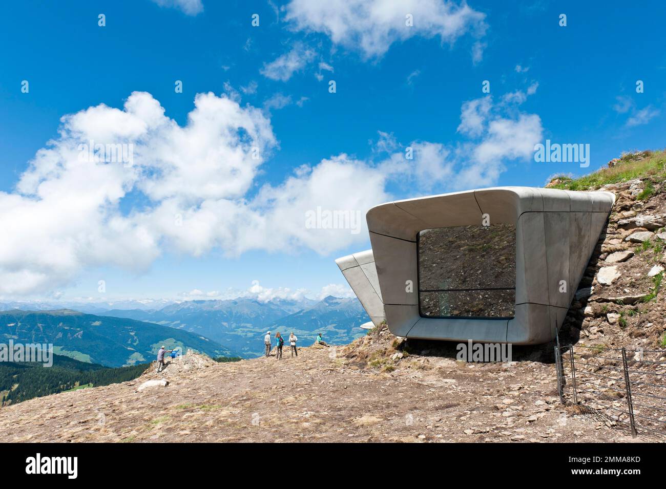 Two large futuristic windows rise out of the mountain, Messner Mountain ...