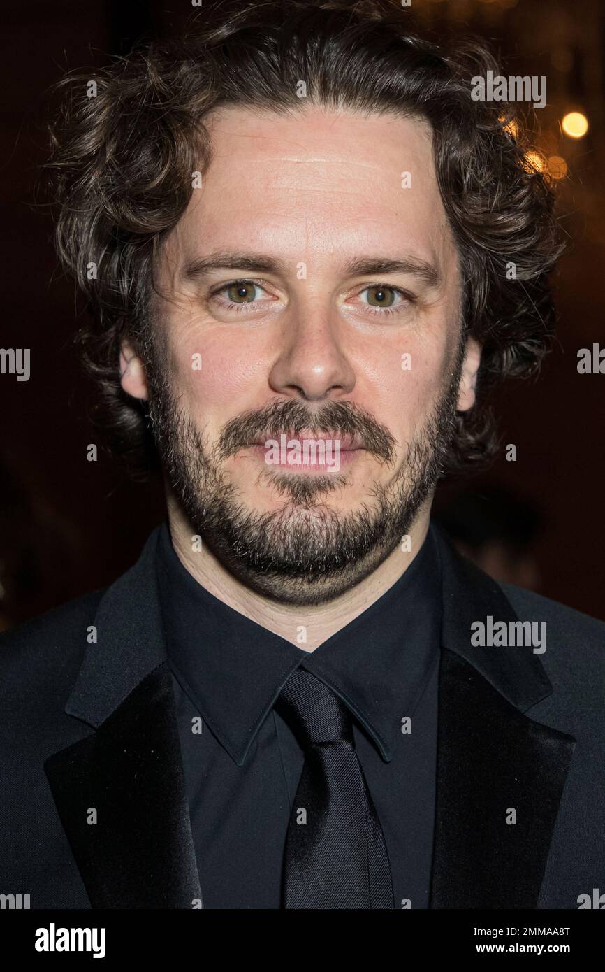 Director Edgar Wright poses for photographers upon arrival at the party ...