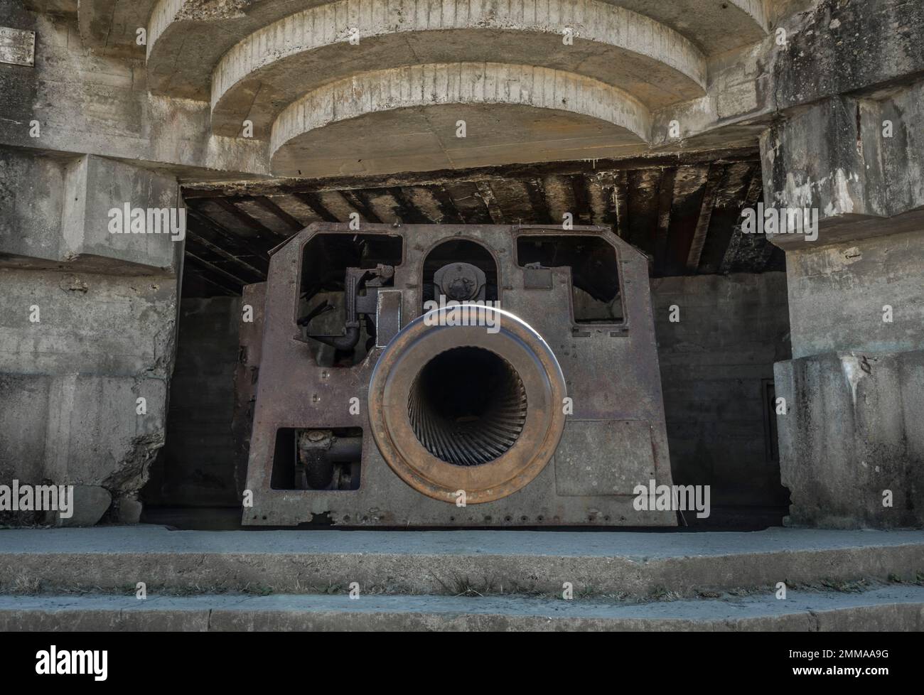 big canon in a historic bunker building Stock Photo - Alamy