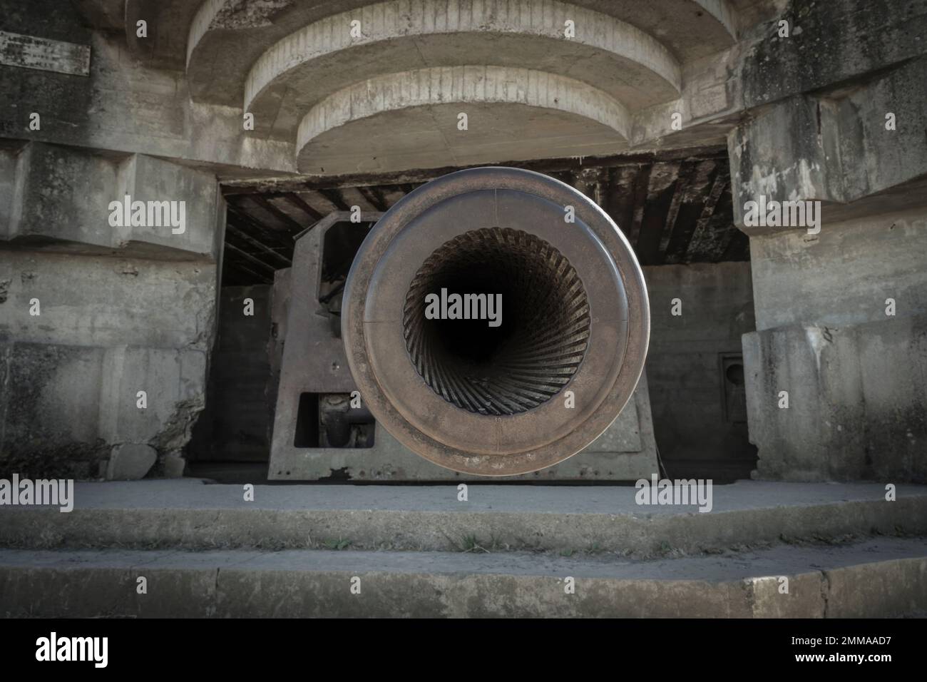 big canon in a historic bunker building Stock Photo - Alamy