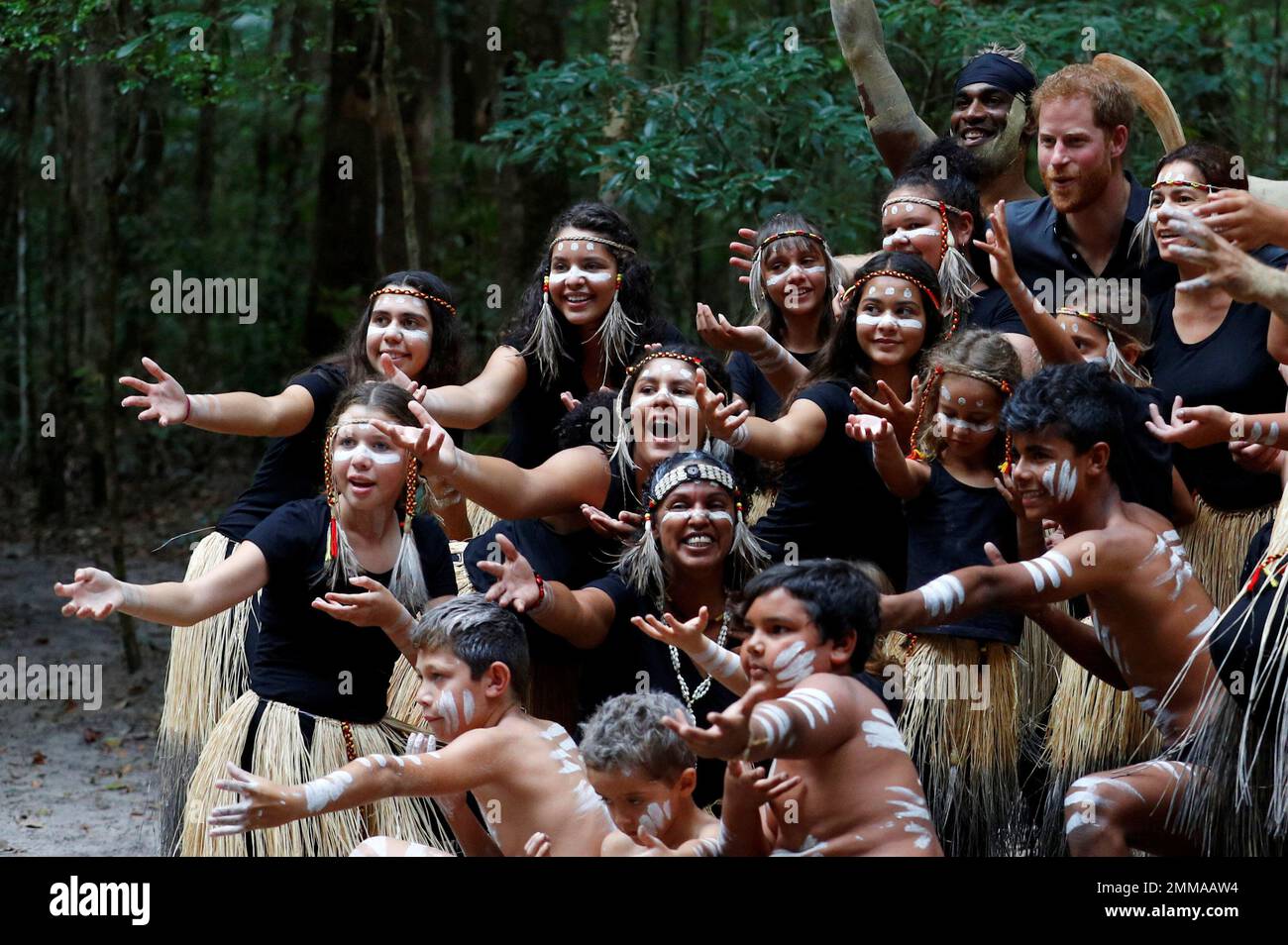 Britain's Prince Harry, the Duke of Sussex takes a photo with Butchulla ...