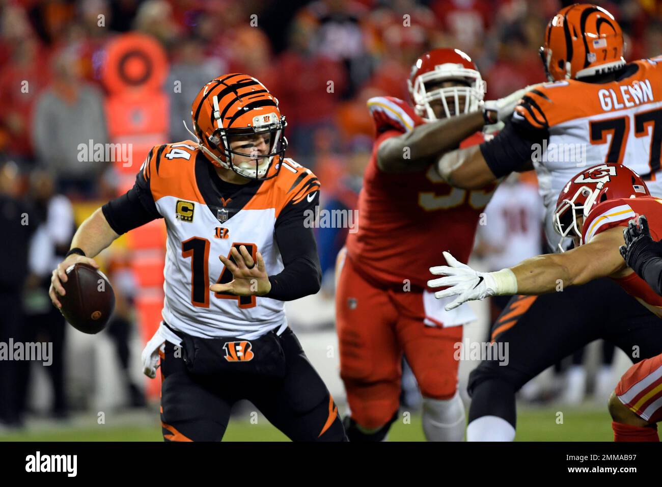 Cincinnati Bengals quarterback Andy Dalton (14) scrambles as linebacker ...