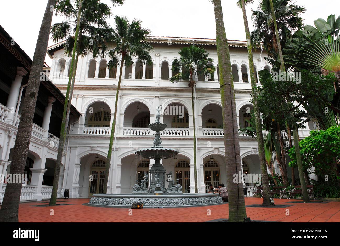 Inner courtyards with fountains, Raffles Hotel, Singapore Stock Photo ...