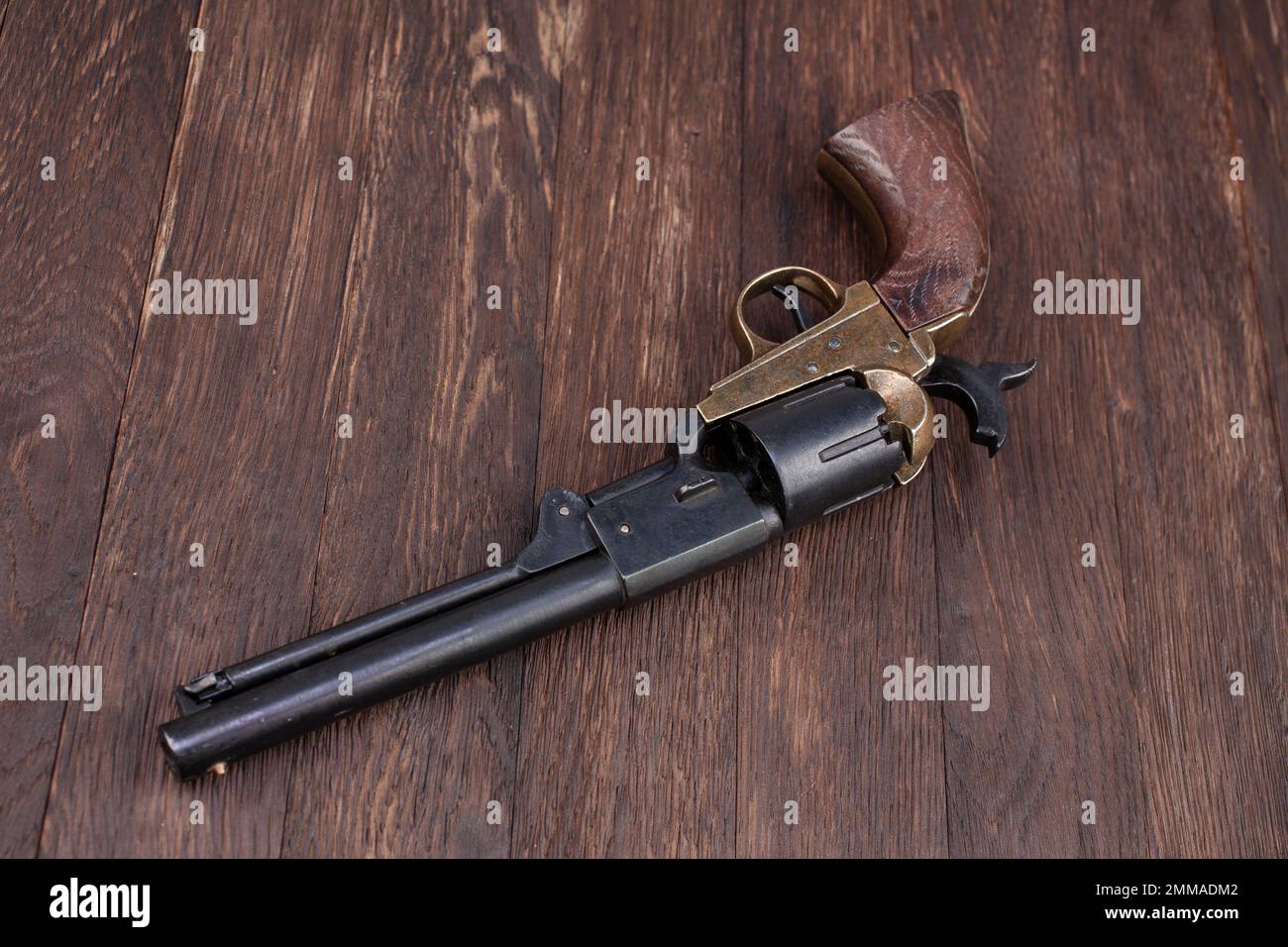 Old West gun - Percussion Army Revolver on wooden table Stock Photo - Alamy