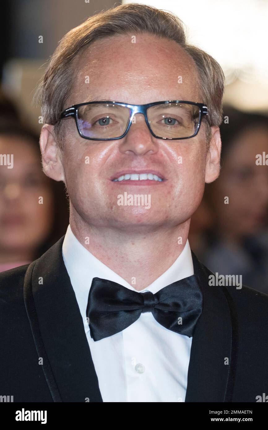 Director Jon S. Baird poses for photographers upon arrival at the ...