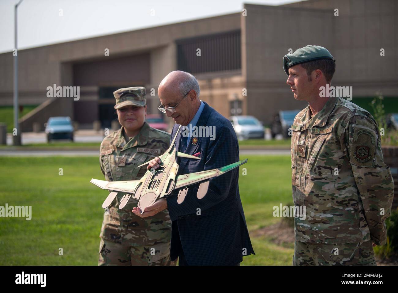 Team Dover members present a gift to Ralph Galati, Air Force veteran and former prisoner of war ...