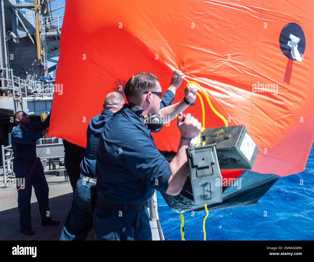 220916-N-UF592-1079 PACIFIC OCEAN (Sept. 16, 2022) Sailors release a ...