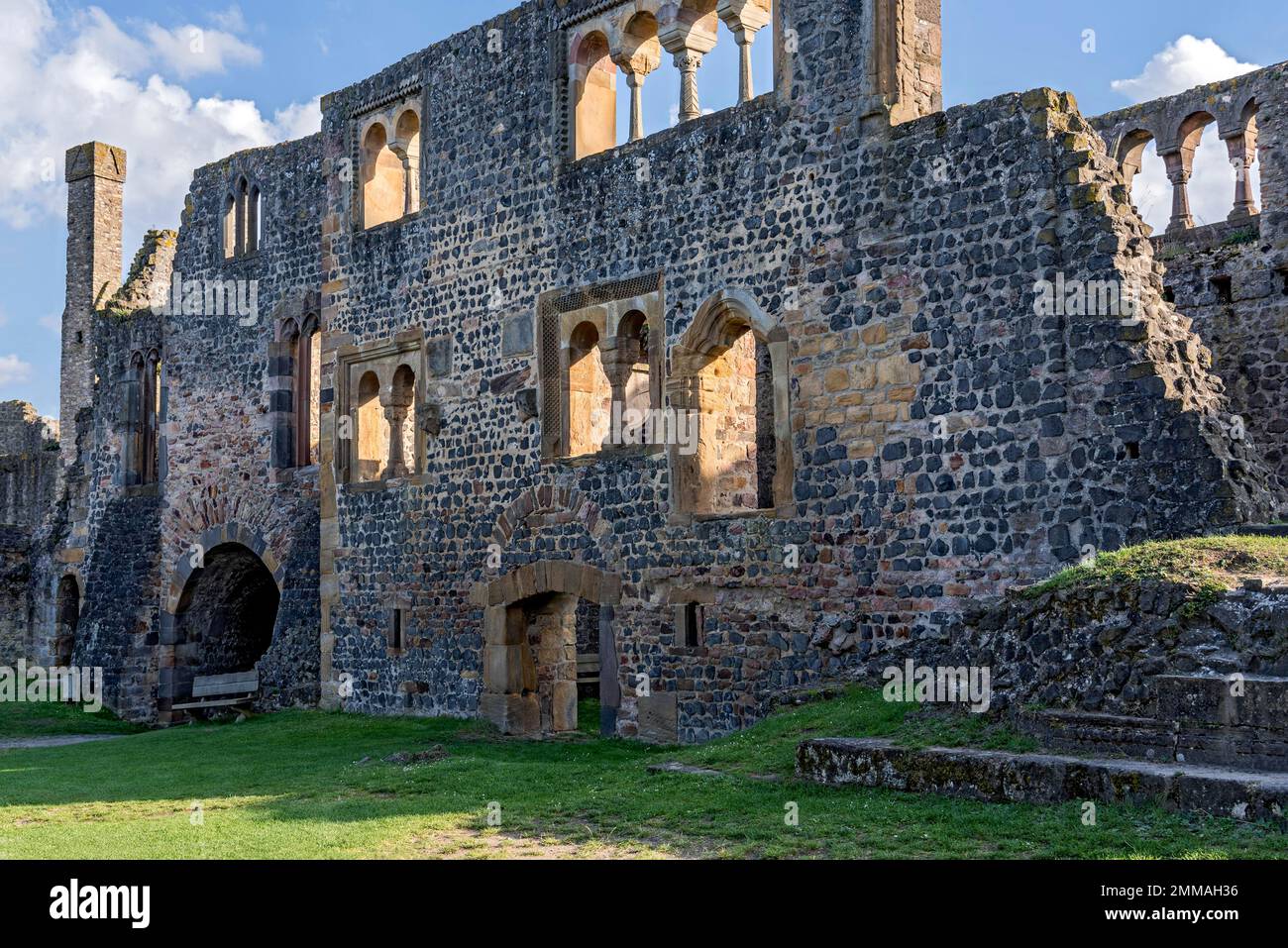 Facade of the Romanesque Muenzenberg Palas with windows and arcades ...
