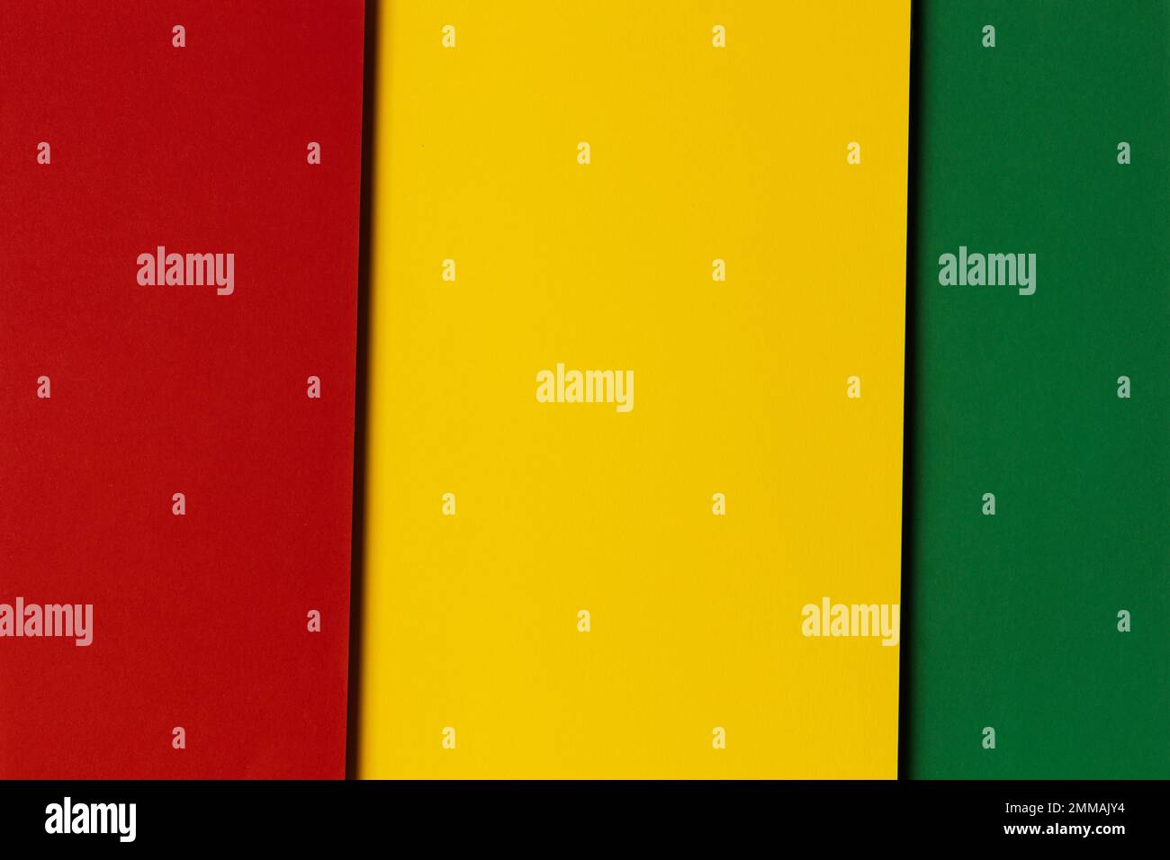 Abstract geometric red, yellow, green color paper background. Black ...