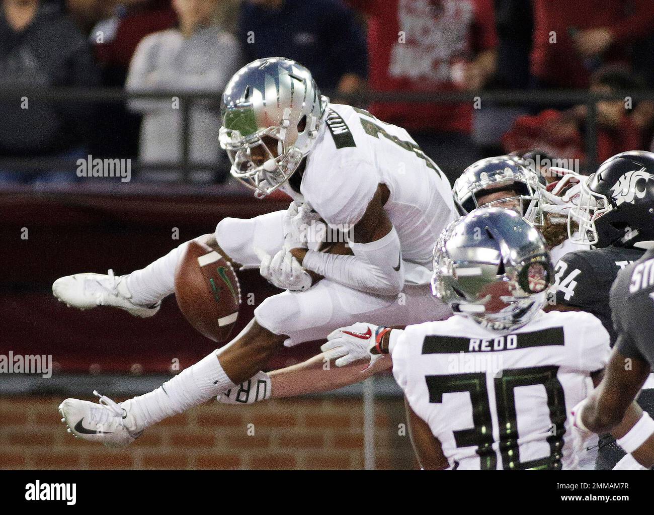 Oregon wide receiver Dillon Mitchell, left, can't hold onto a pass in ...