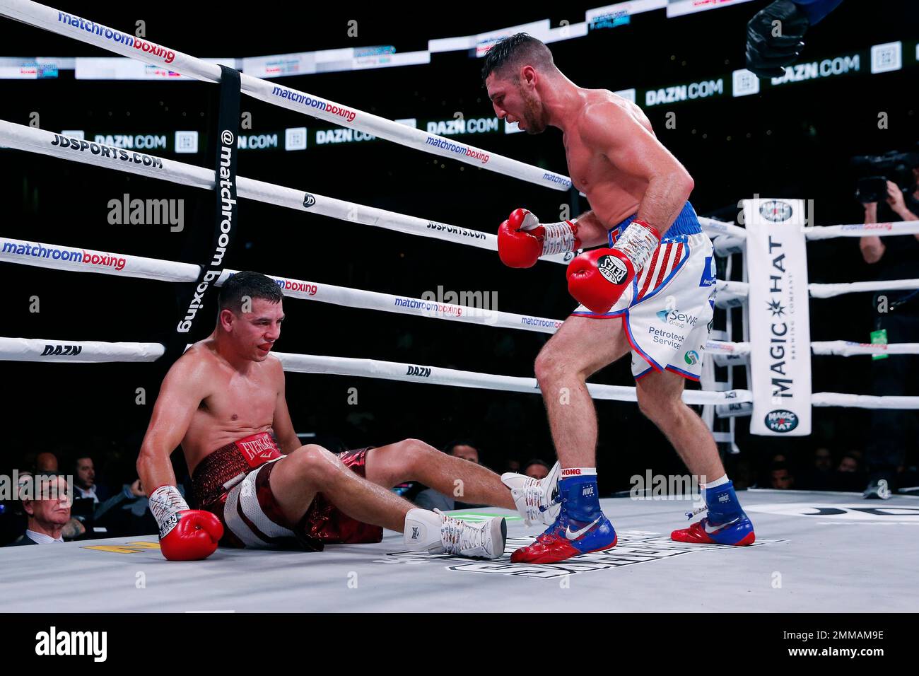 Tommy Coyle, of England, stands over Ryan Kielczweski after knocking ...