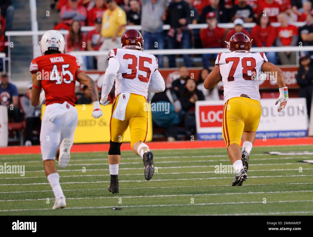 Southern California defensive lineman Jay Tufele (78) runs a fumble ...