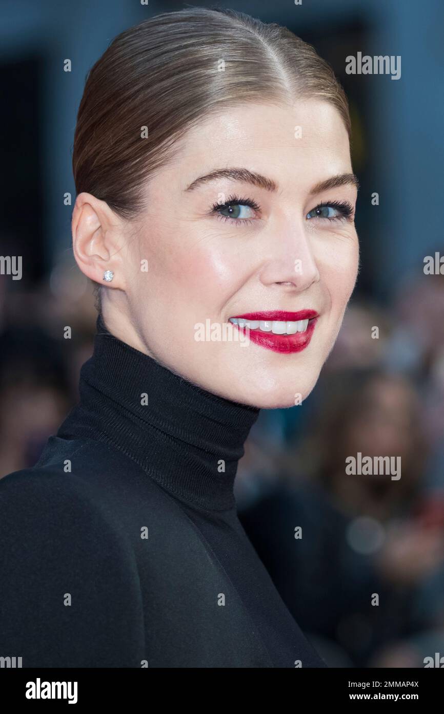 Actress Rosamund Pike poses for photographers upon arrival at the ...