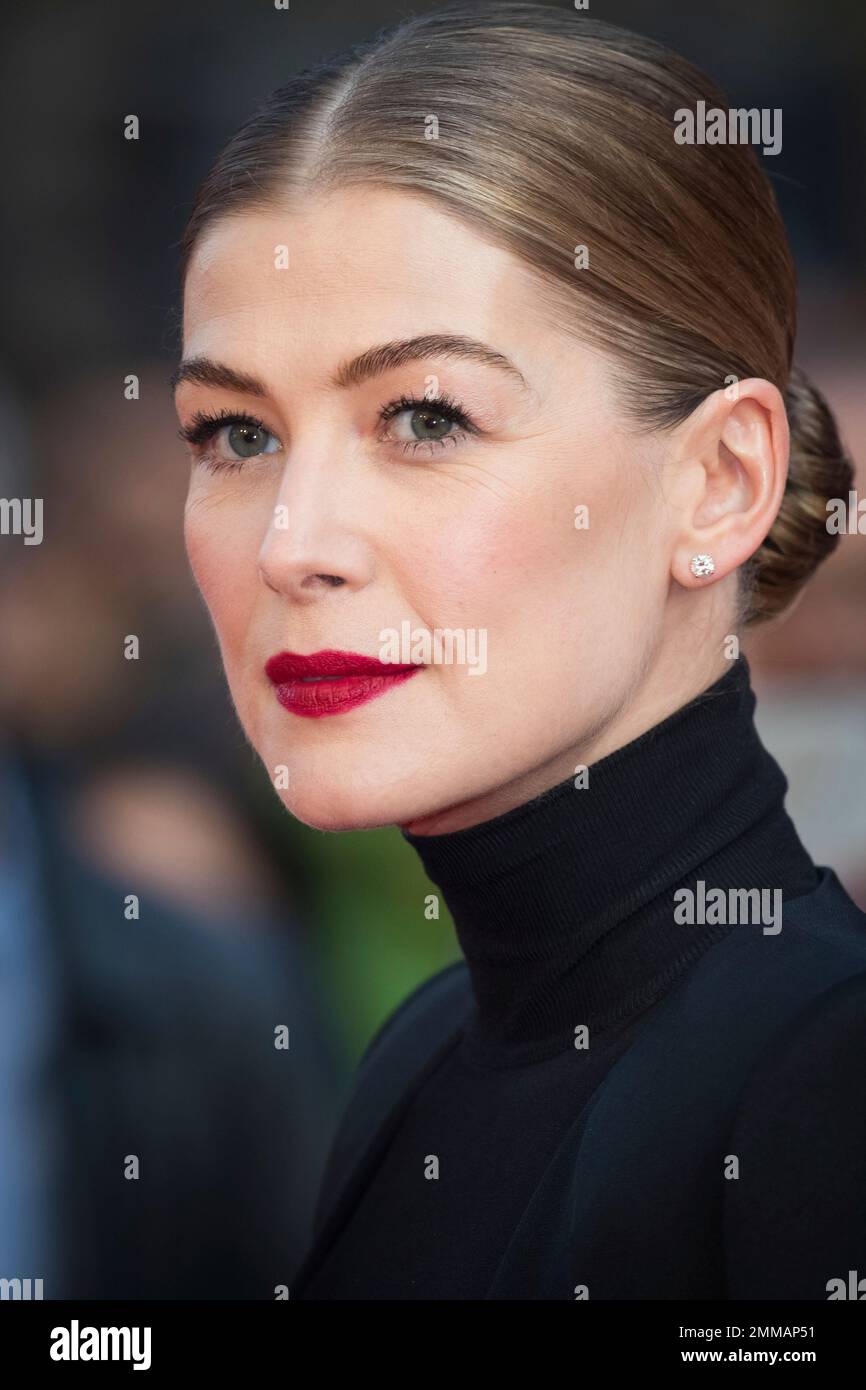 Actress Rosamund Pike poses for photographers upon arrival at the ...