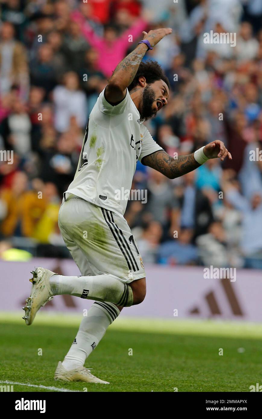 Real Madrid's Marcelo celebrates after scoring his side's 1st goal ...