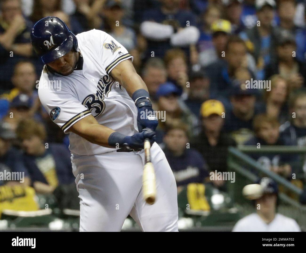 Milwaukee Brewers' Jesús Aguilar hits an RBI single during the eighth ...