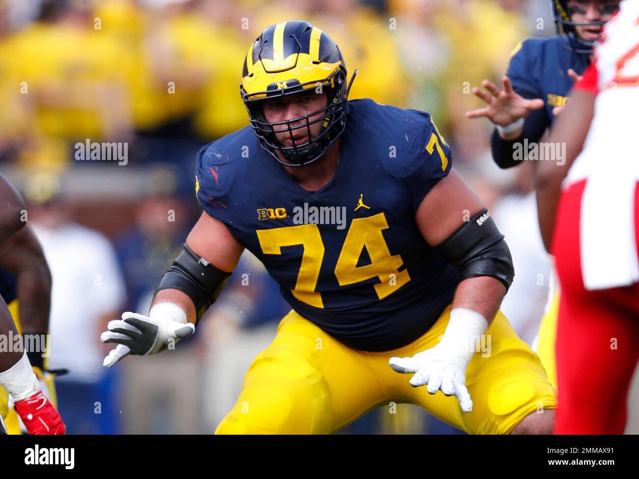 Michigan offensive lineman Ben Bredeson plays against Maryland in the ...