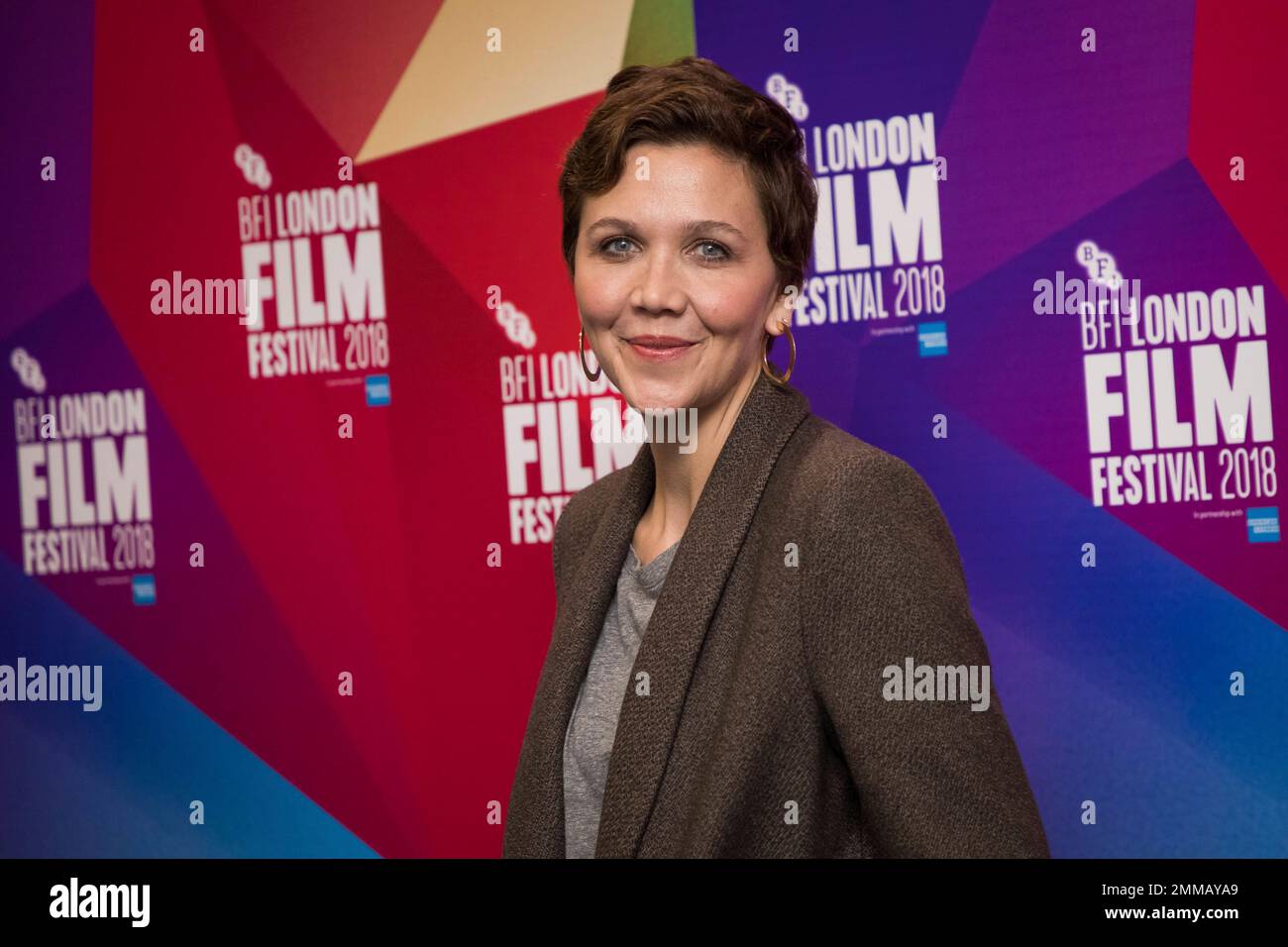 Actress Maggie Gyllenhaal poses for photographers ahead of a screen ...