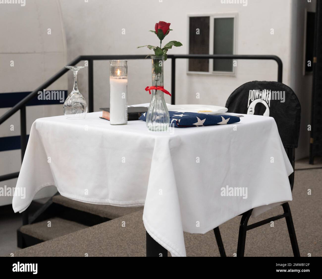 A table set for one representing U.S. military prisoners of war and ...