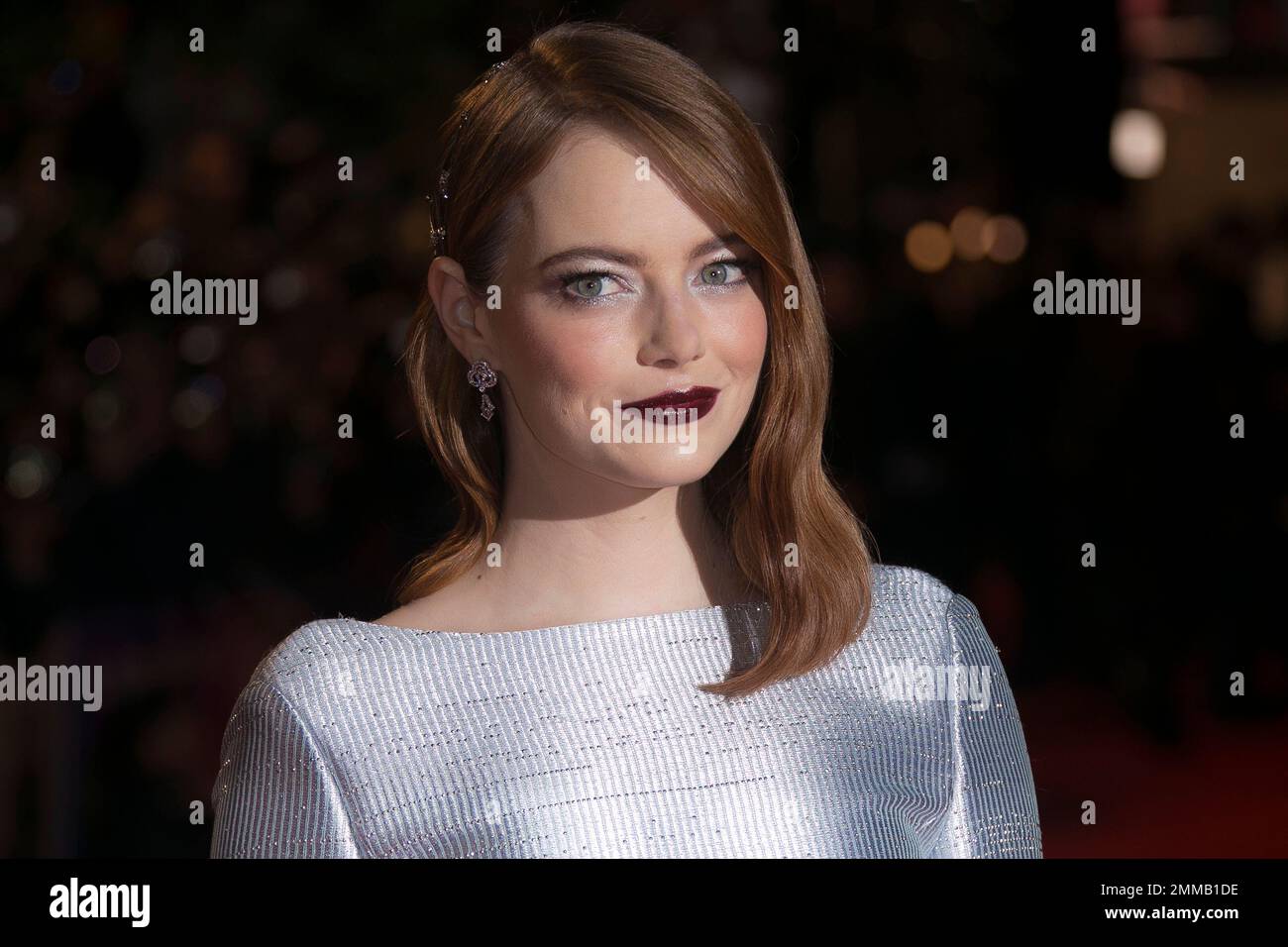 Actresses Emma Stone poses for photographers upon arrival at the ...