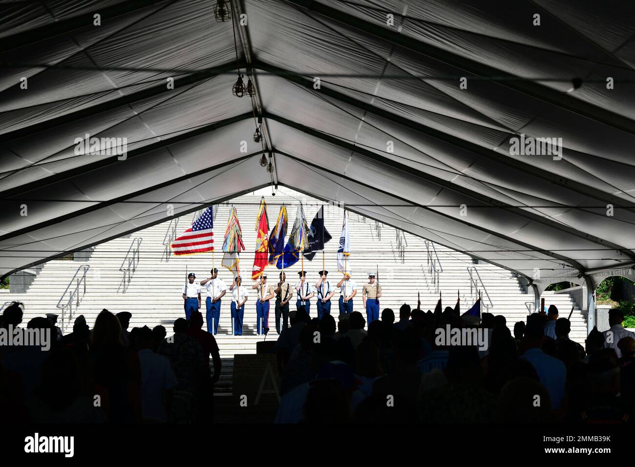 Members of the U.S. Indo-Pacific Joint Service Color Guard posts colors ...