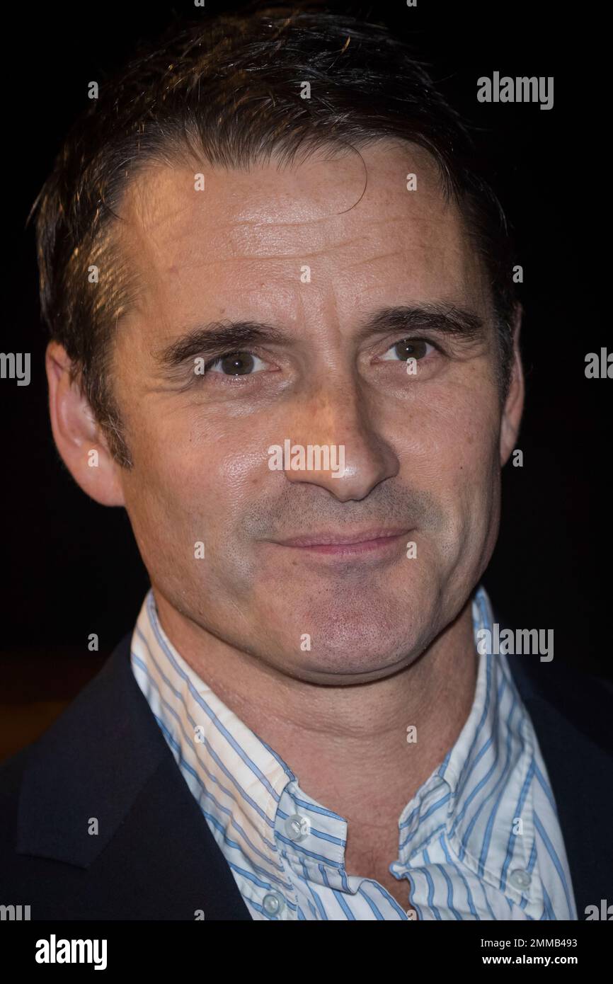 Alastair Mackenzie poses for photographers upon arrival at the premiere ...