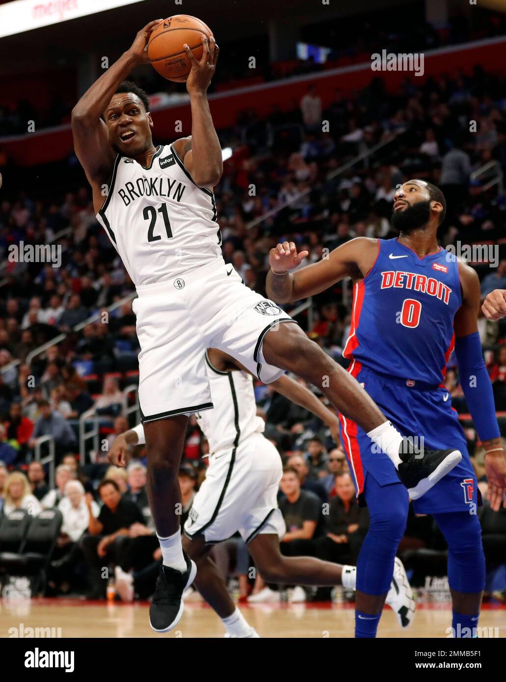 Brooklyn Nets guard Treveon Graham (21) pulls down a rebound during the ...