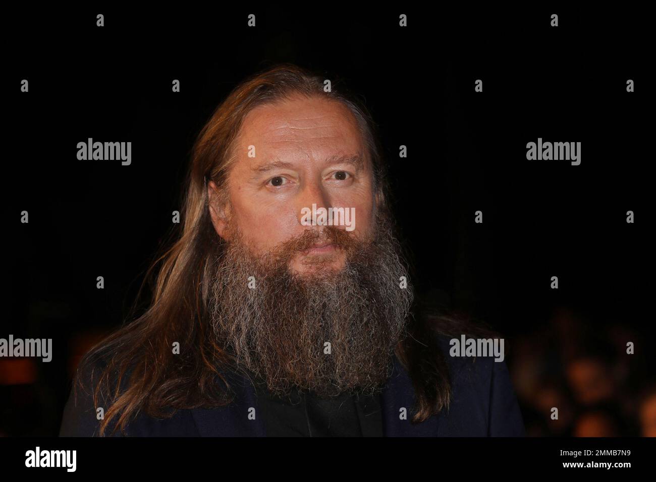 Director David Mackenzie poses for photographers upon arrival at the ...